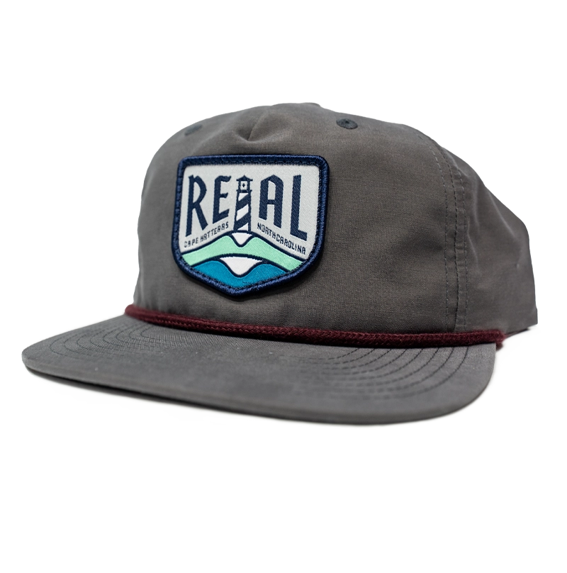 REAL Lighthouse Badge Hat-Charcoal/Burgundy — REAL Watersports